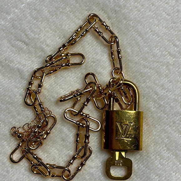 Louis Vuitton | Accessories | Authentic Lv Lock Key34 With Chain | Poshmark